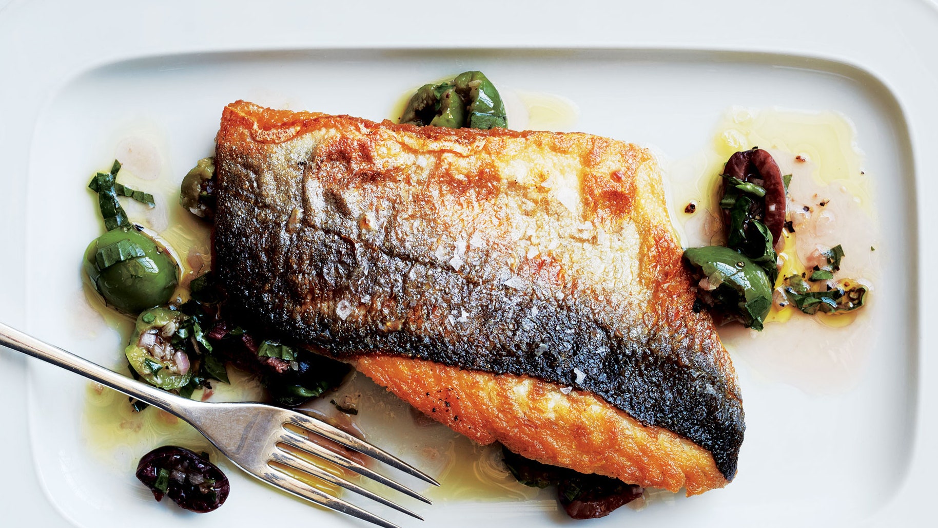 How do you stop fish skin sticking to the pan?