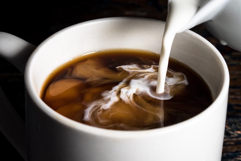 How do you stop non-dairy milk curdling in coffee?