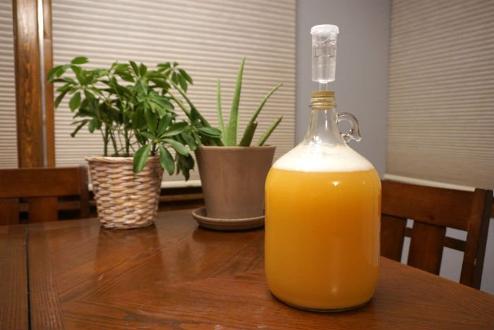 How do you stop the fermentation in cider?