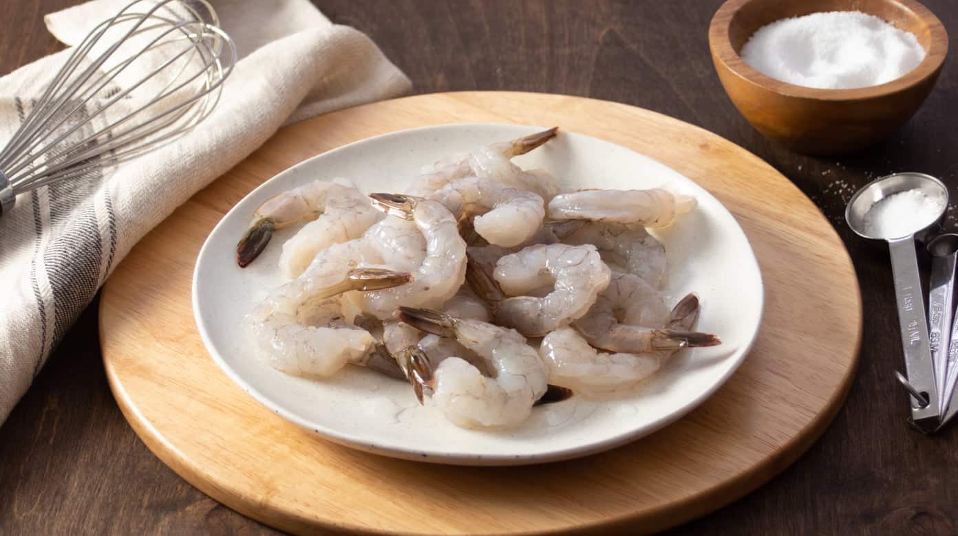 How do you store cooked shrimp in a brine?