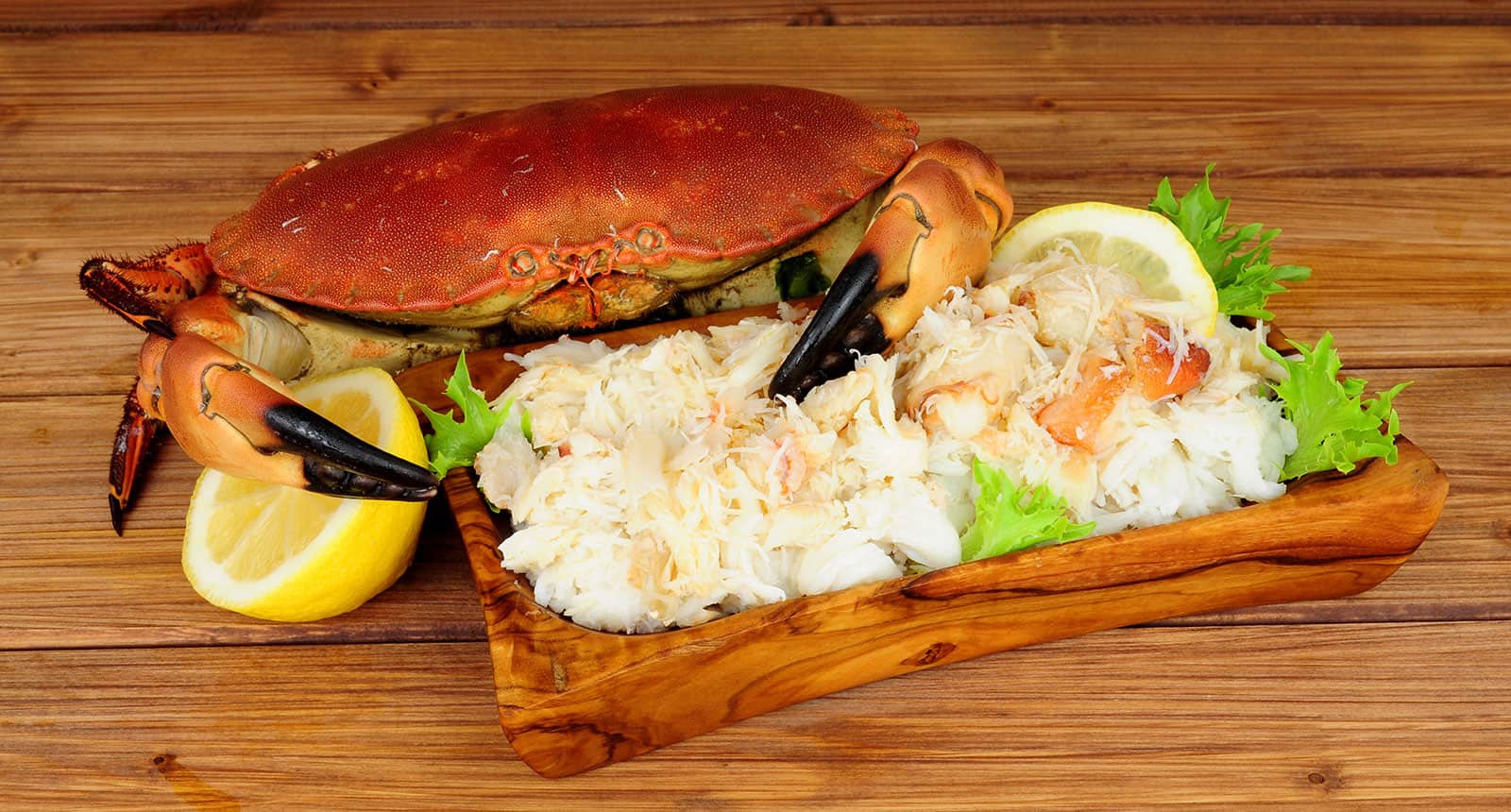 How do you store fresh crab meat after cooking?