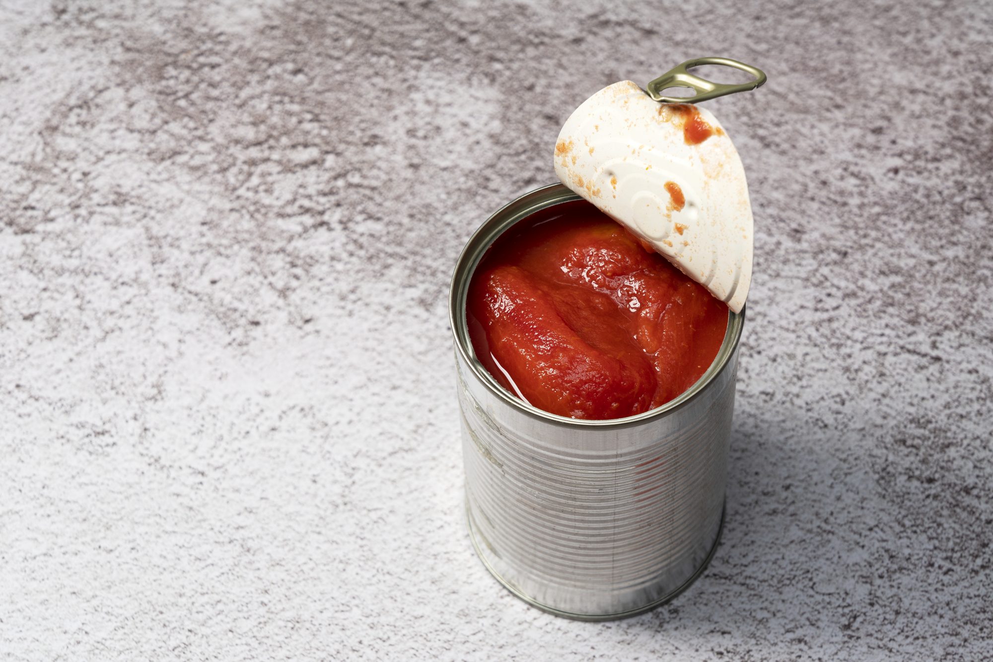 How do you store opened canned crushed tomatoes?