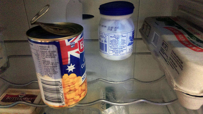 How do you store opened canned food?