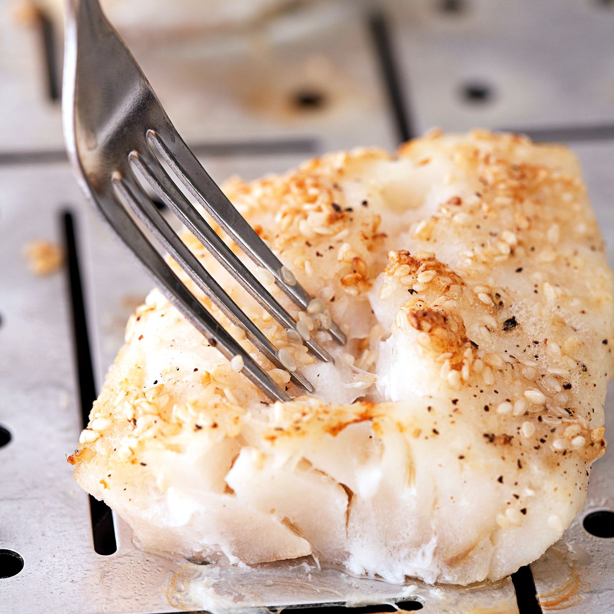 How do you tell if poached fish is cooked?