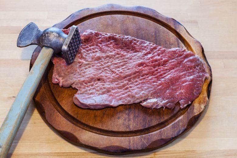 How do you tenderize a tough steak?