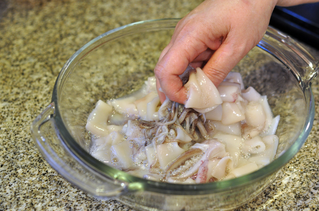 How do you tenderize calamari with bicarbonate of soda?