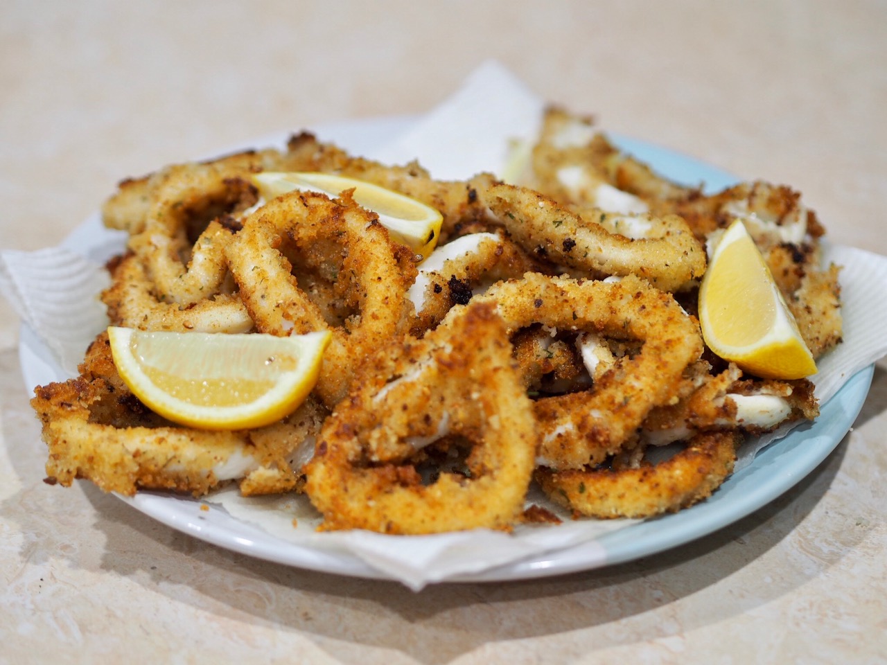 How do you tenderize fresh calamari?