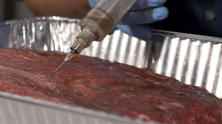 How do you use a marinade injector for brisket?