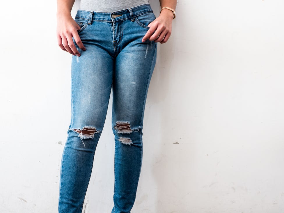 How do you wash new jeans without losing color?