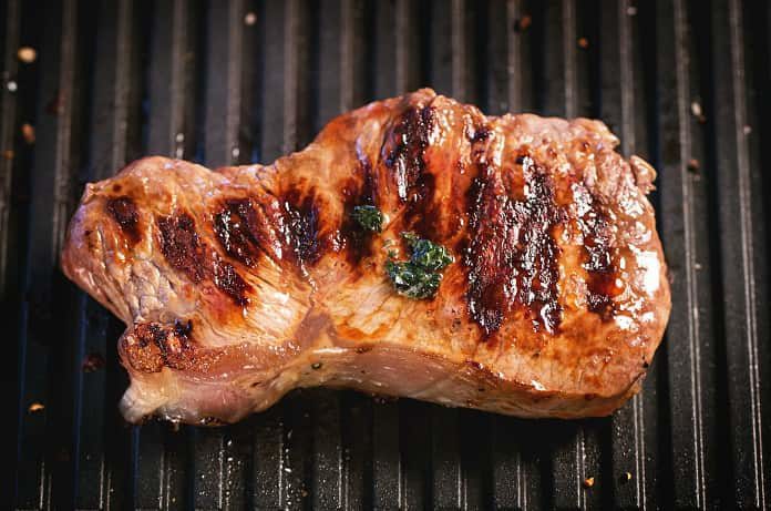 How does cooking meat affect the protein?