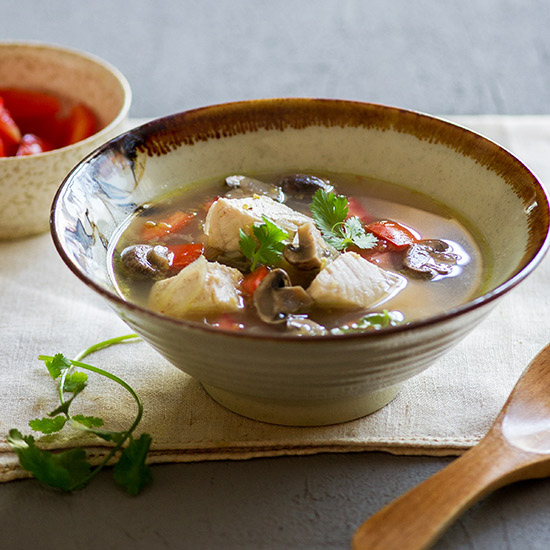 How does fish soup symbolize the Hmong people?