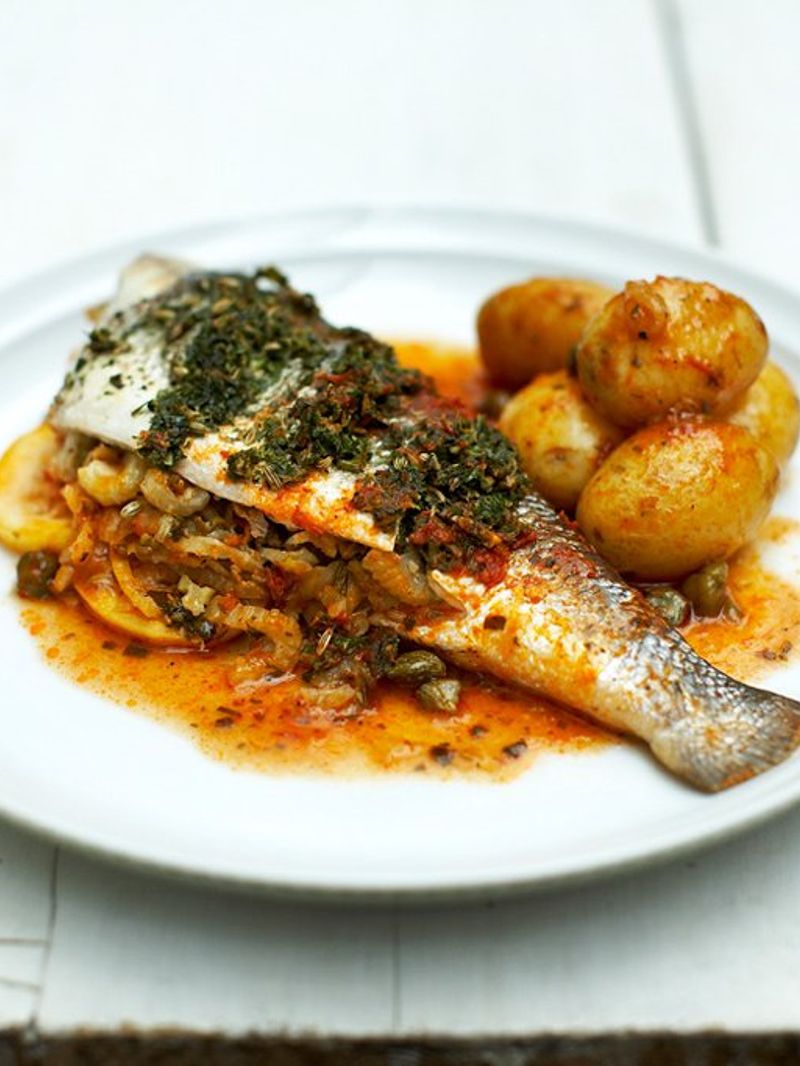 How does Jamie Oliver cook sea bass?