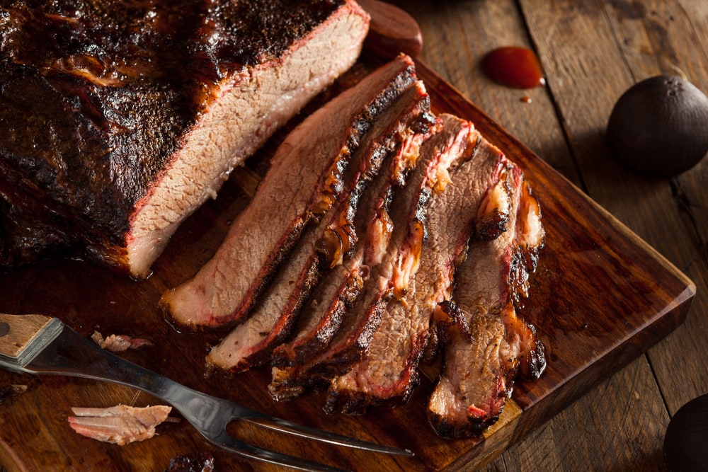 How is brisket typically served?
