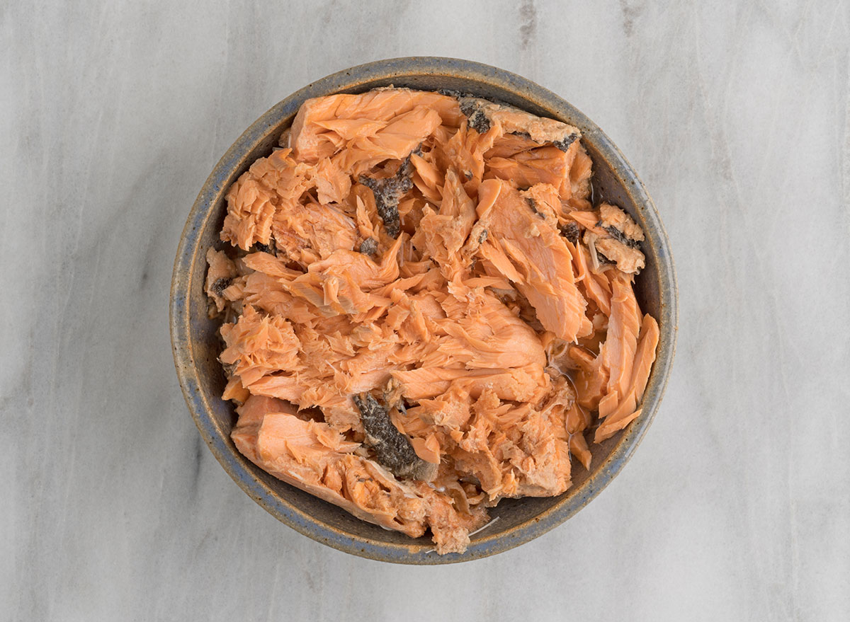 How is canned salmon canned?
