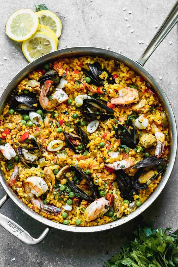 How is paella cooked?