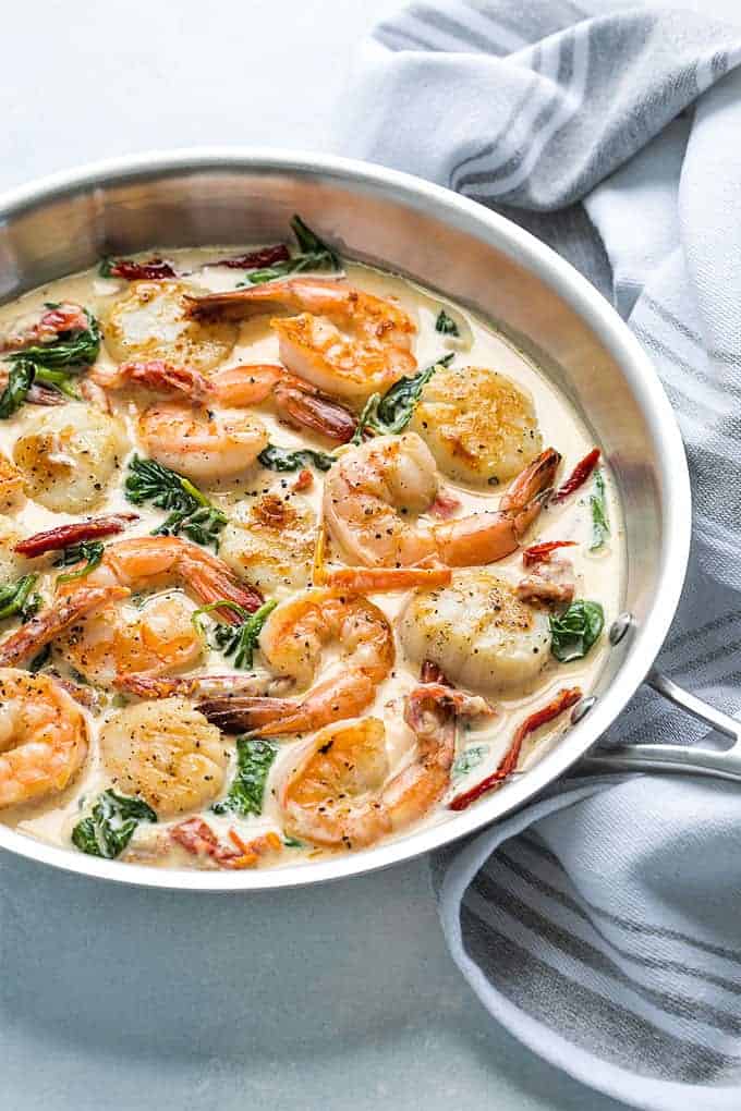 How long are cooked shrimp and scallops good for?