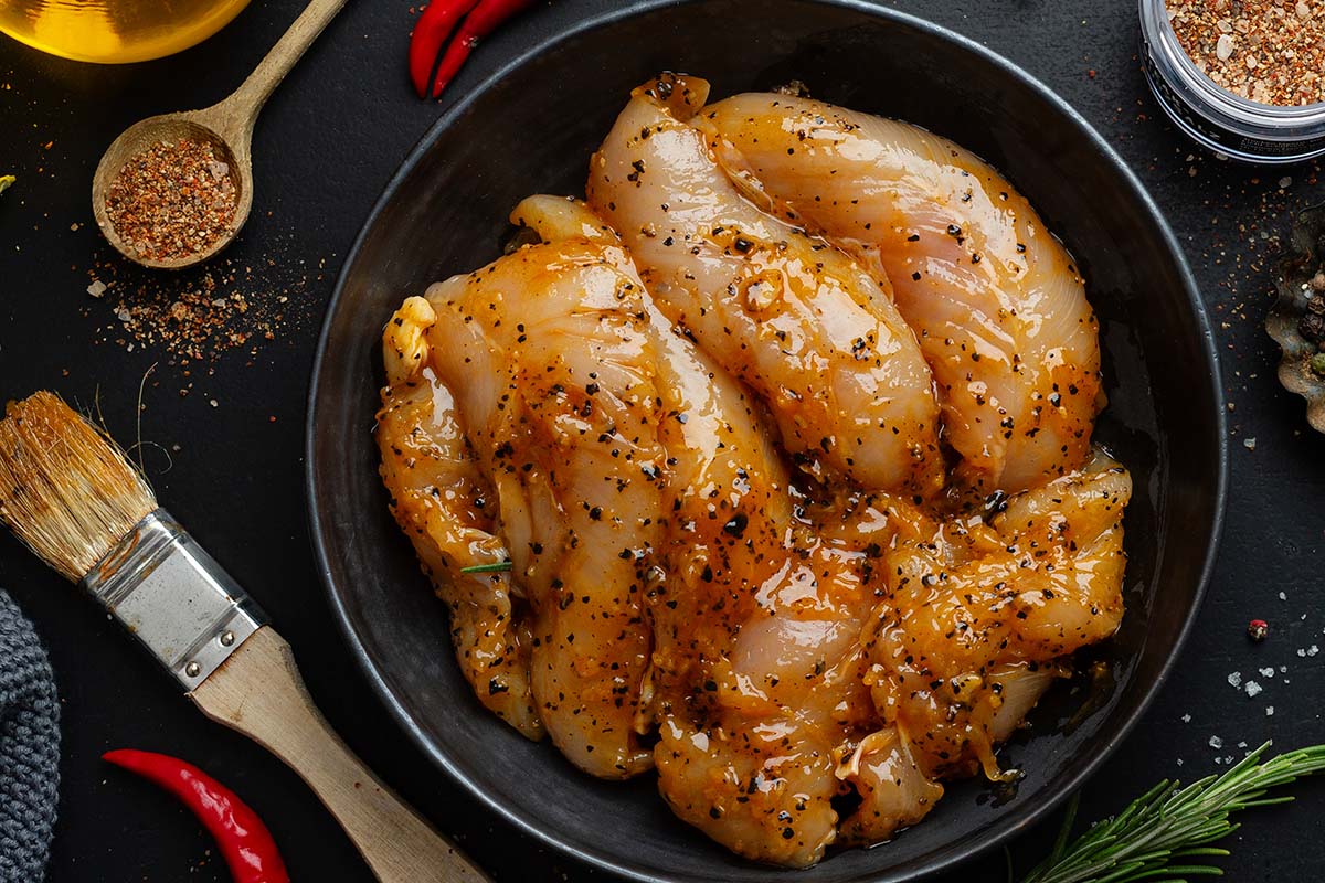 How long can chicken be marinated before it goes bad?