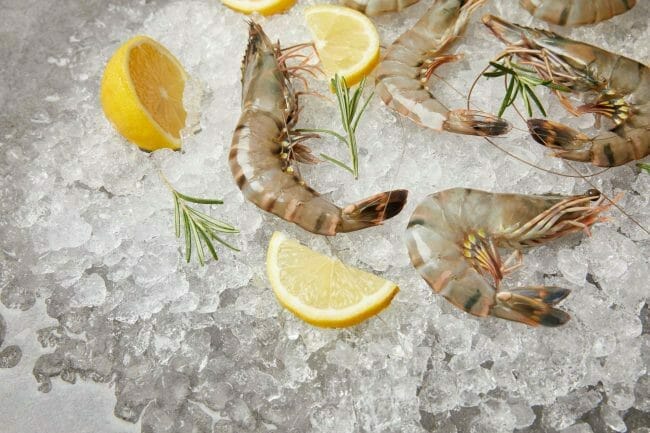 How long can raw shrimp sit out at room temperature?