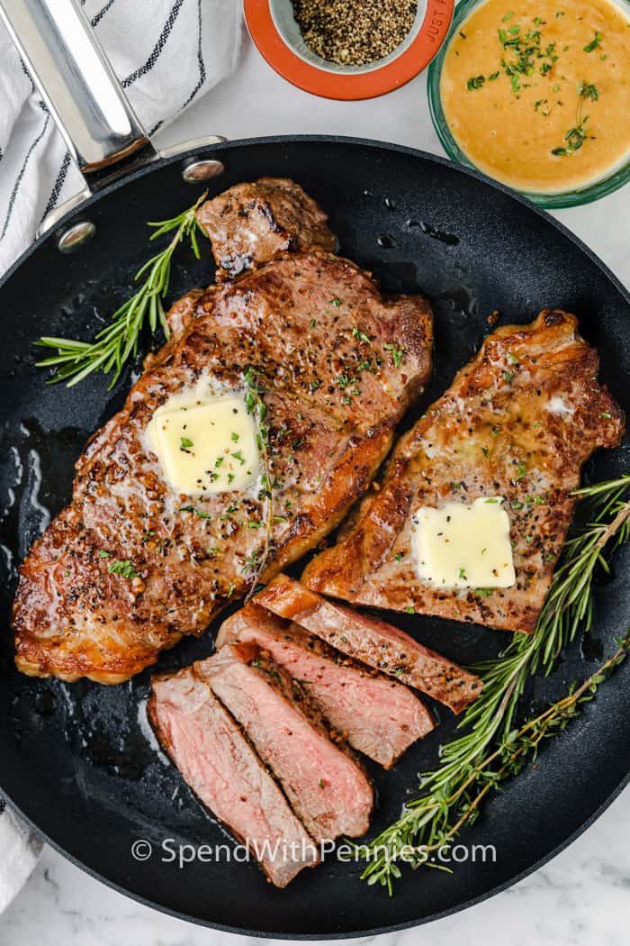 How long do you cook 2 steaks in the oven?