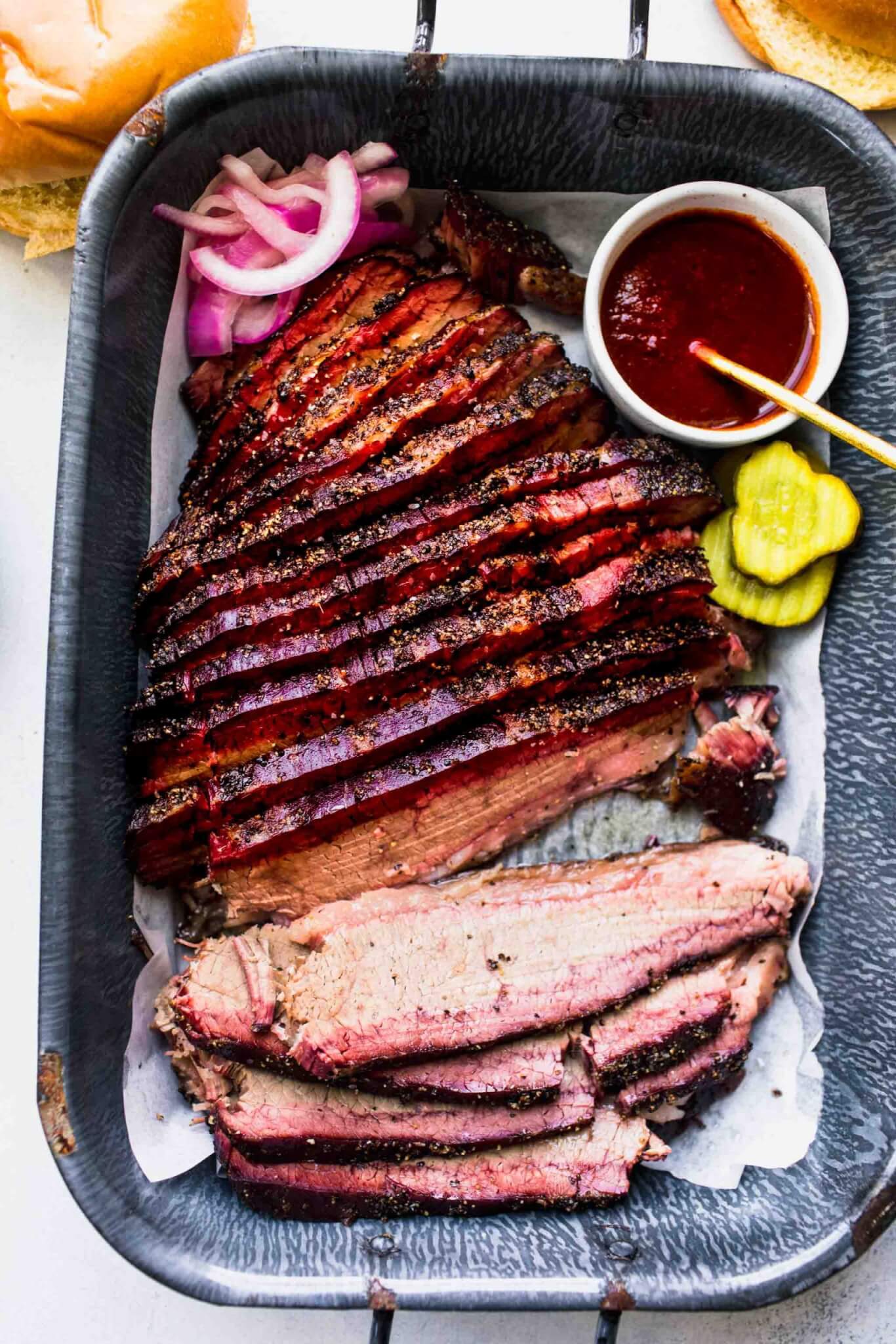 How long do you cook a brisket in sauce before grilling?