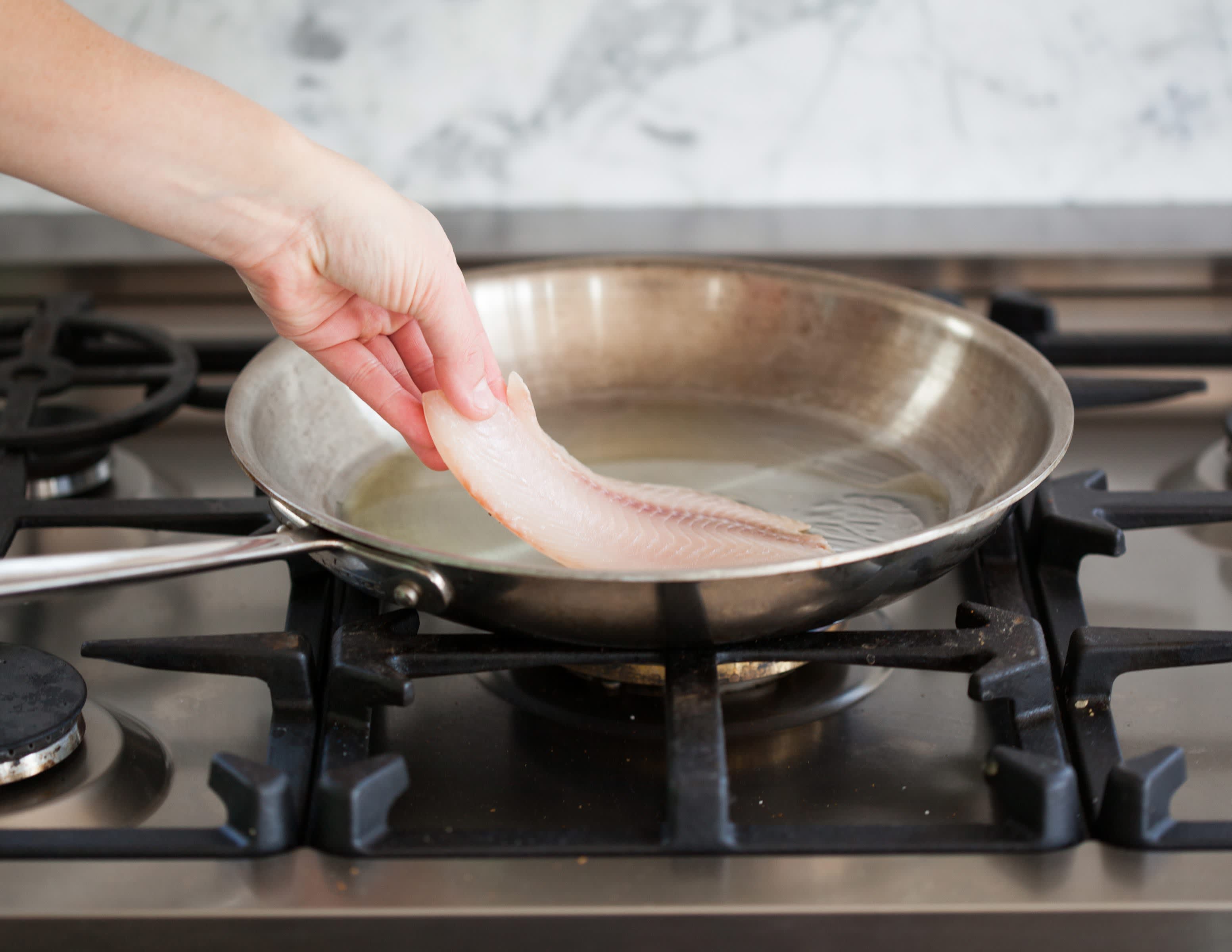 How long do you cook a fish on the stove?
