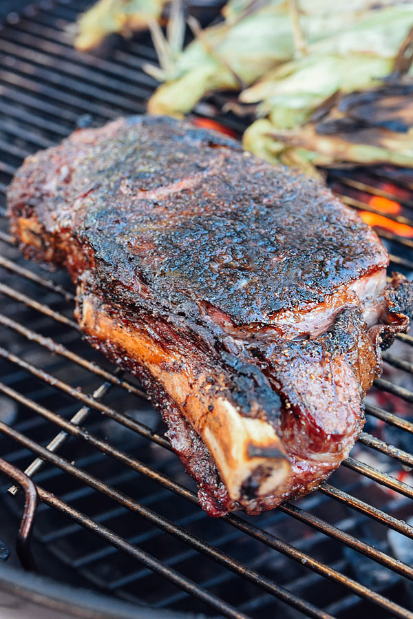 How long do you cook a ribeye steak on a charcoal grill?