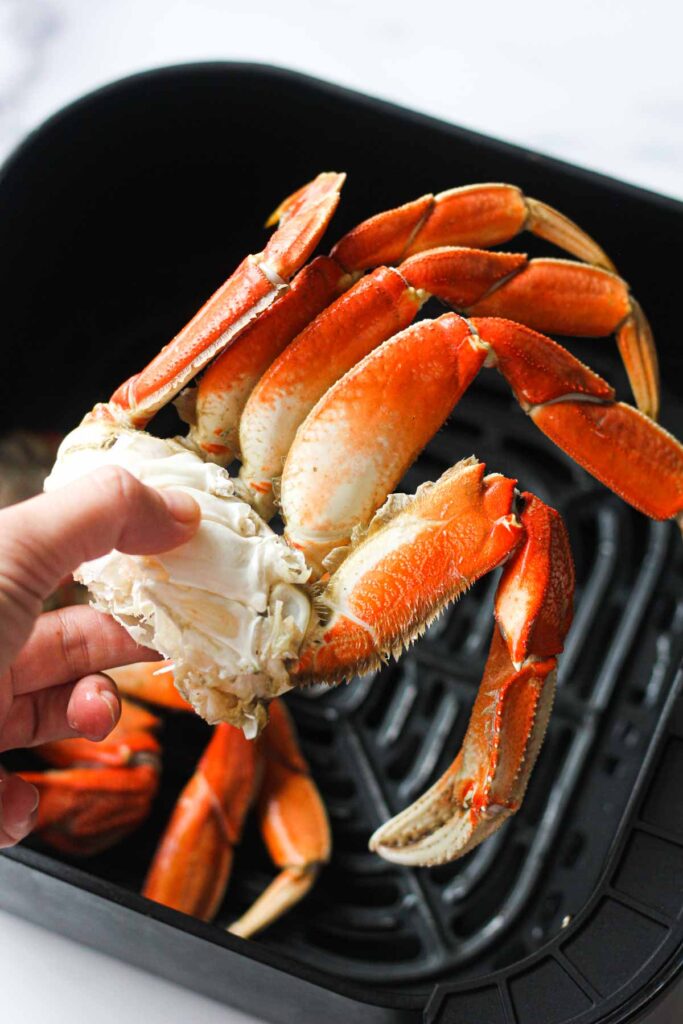 How long do you cook frozen Dungeness crab legs?