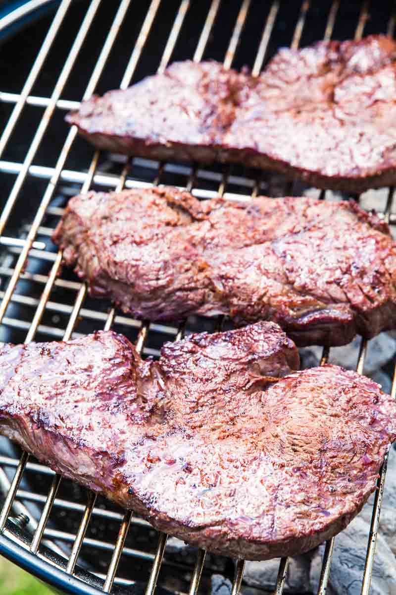 How long do you cook steak on charcoal?