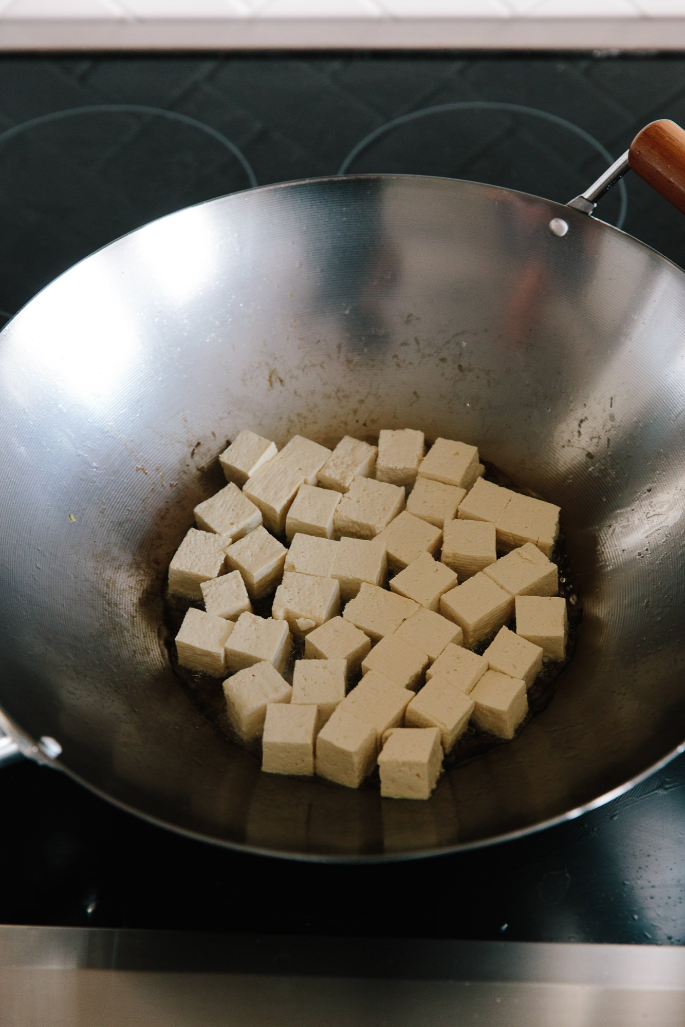 How long do you cook tofu in a wok?
