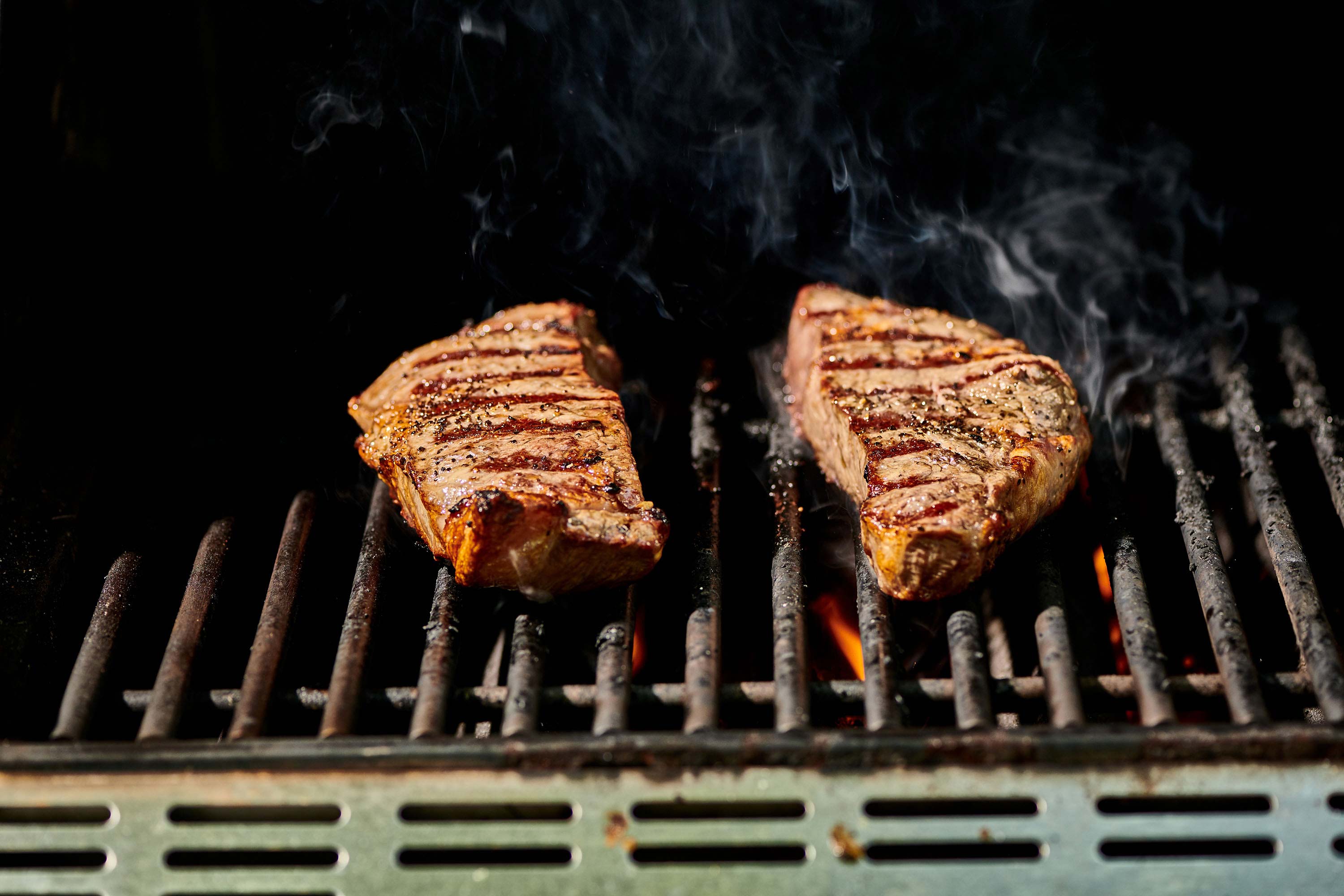 How long do you grill a 1 inch thick strip steak?