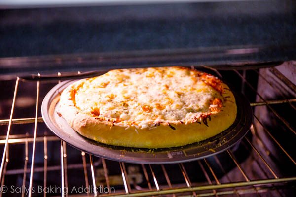 How long do you put a cheese pizza in the oven?