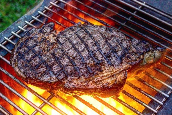 How long do you sear a steak on a grill?