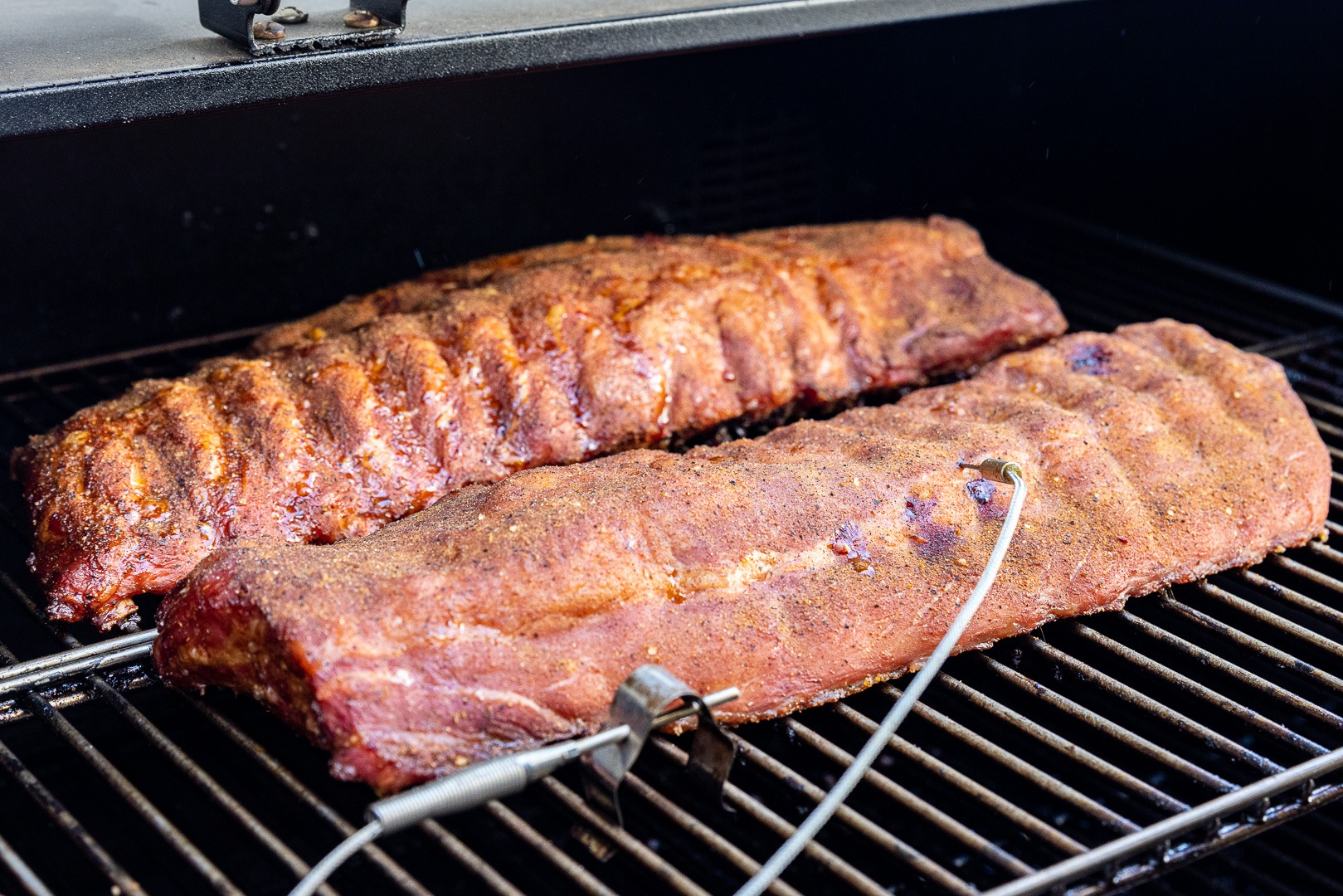 How long do you smoke ribs at 150 degrees?