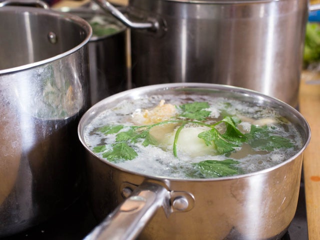 How long does chicken broth typically simmer?
