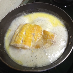How long does haddock take to poach in milk?