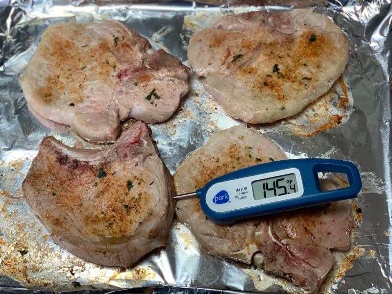 How long does it take to bake pork chops and at what temperature?