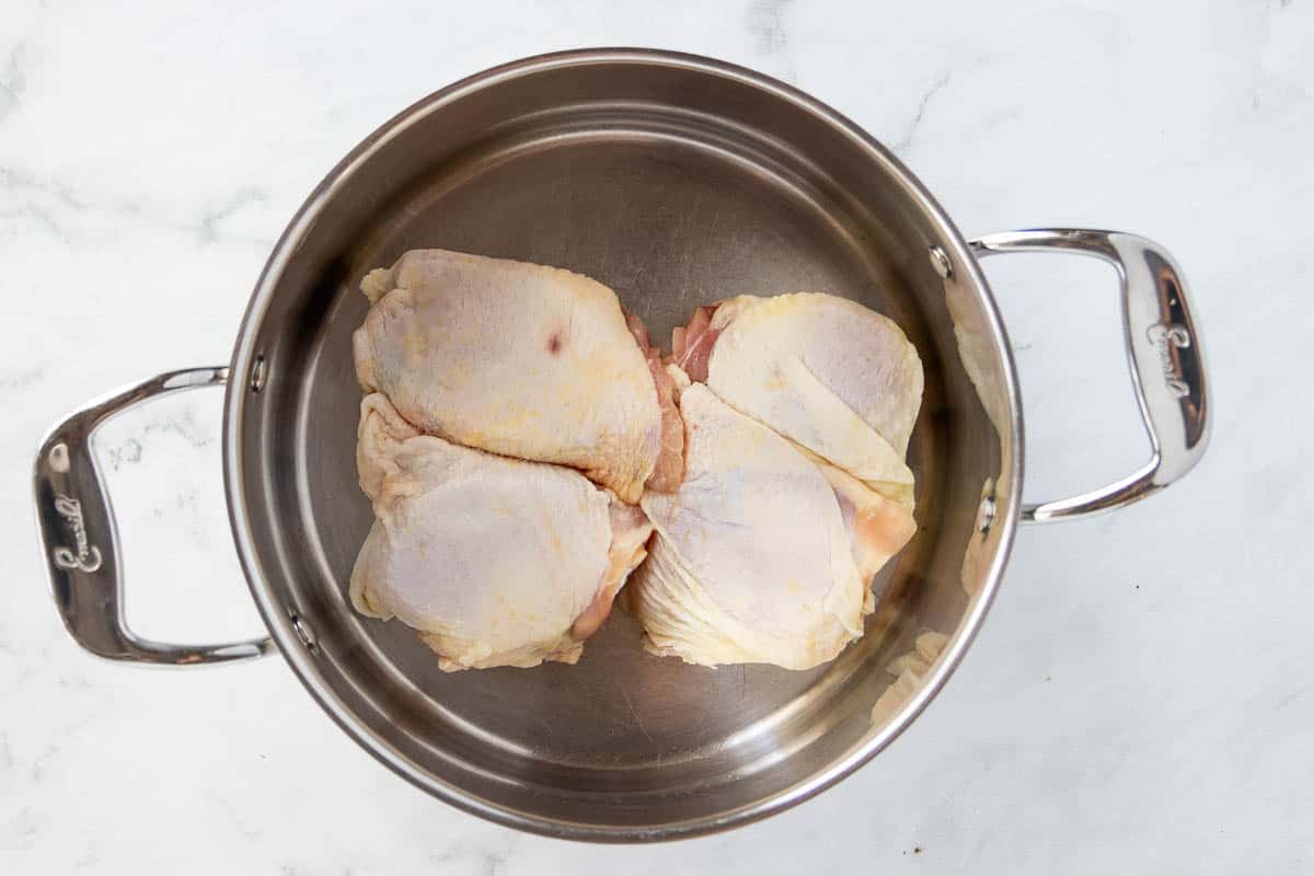 How long does it take to boil chicken thighs off the bone?