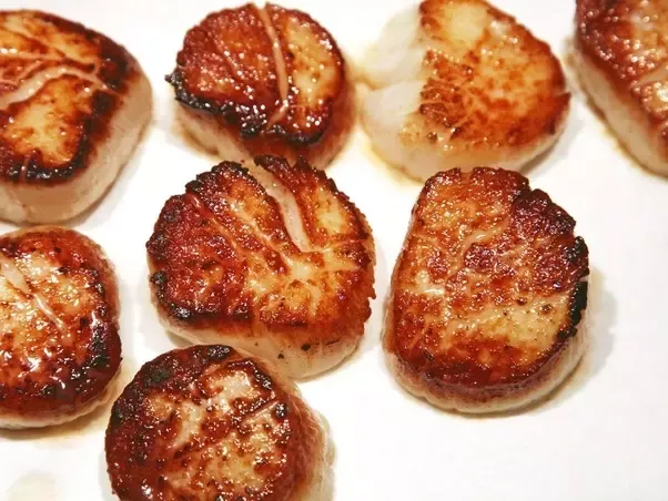 How long does it take to cook scallops in boiling water?