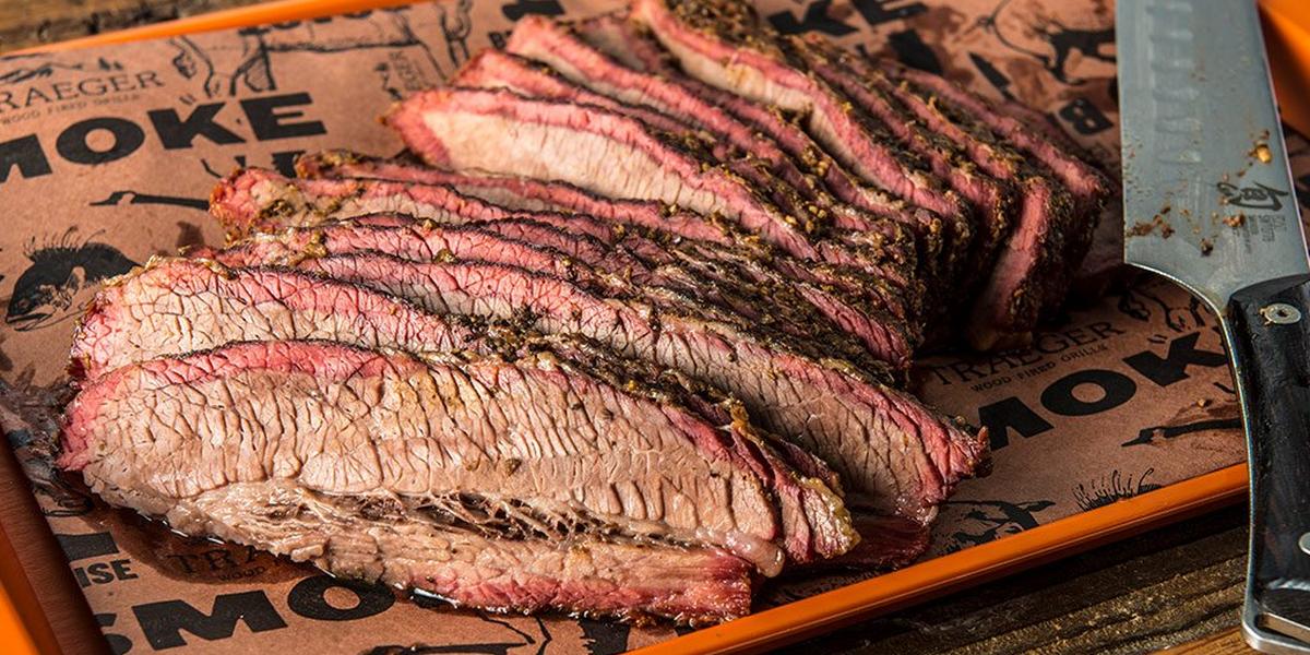 How long does it take to smoke a 12-pound brisket on a Traeger?