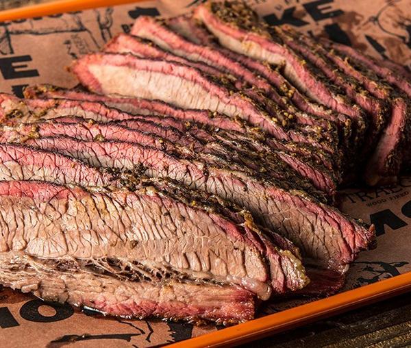How long does it take to smoke a brisket on a Traeger pellet grill?