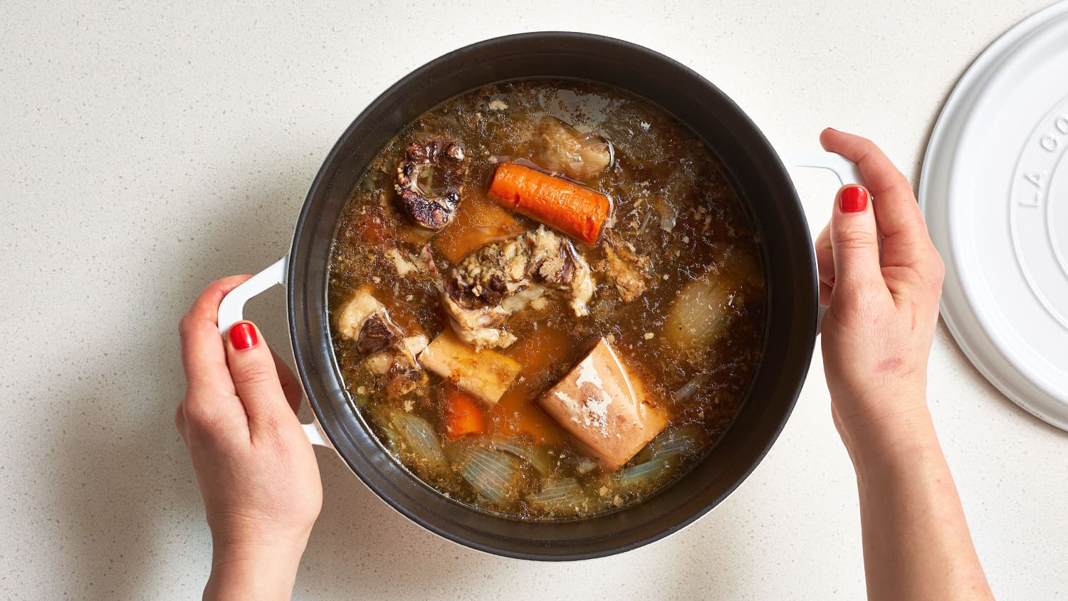 How long should you simmer beef bones?