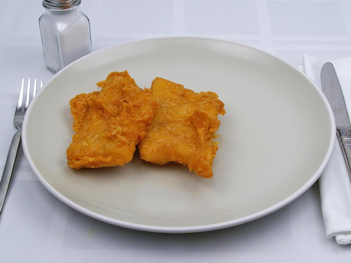 How many calories are in 2 pieces of battered cod?