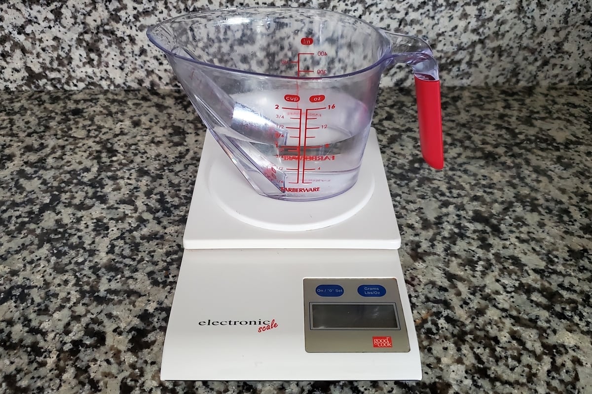 How many grams does 8 oz of water weigh?