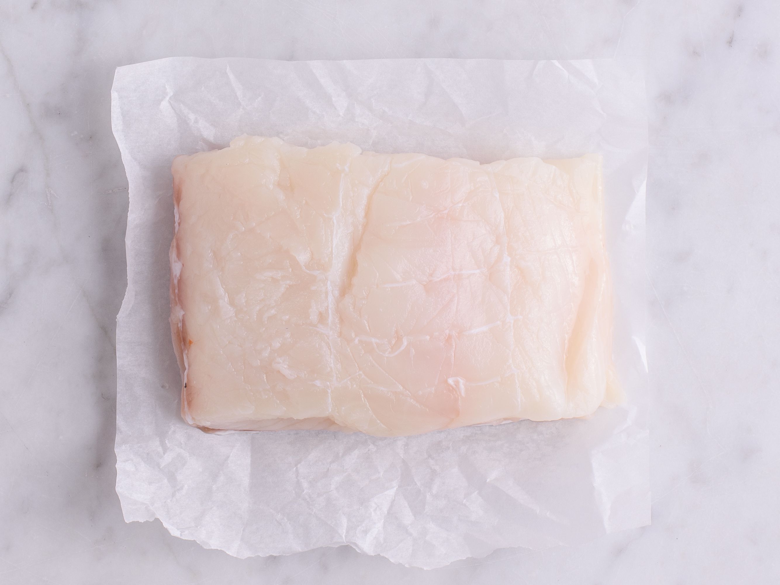 How many ounces of halibut is a serving?