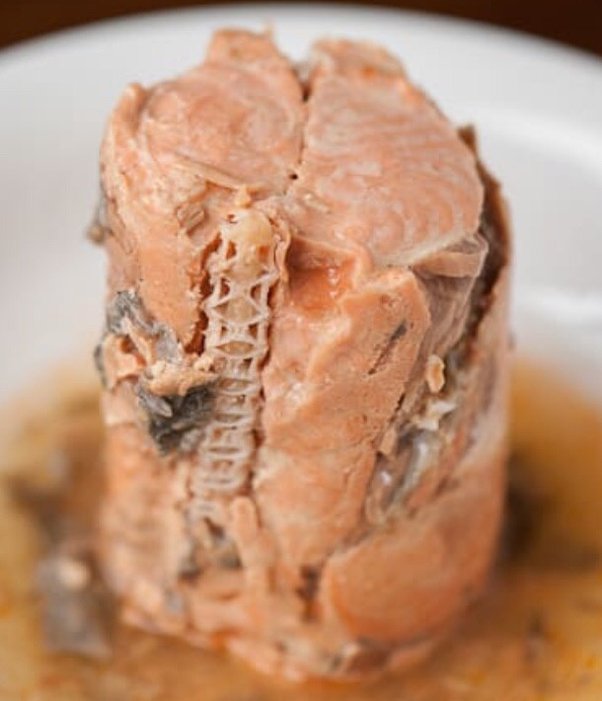 How much calcium is in canned pink salmon with bones?