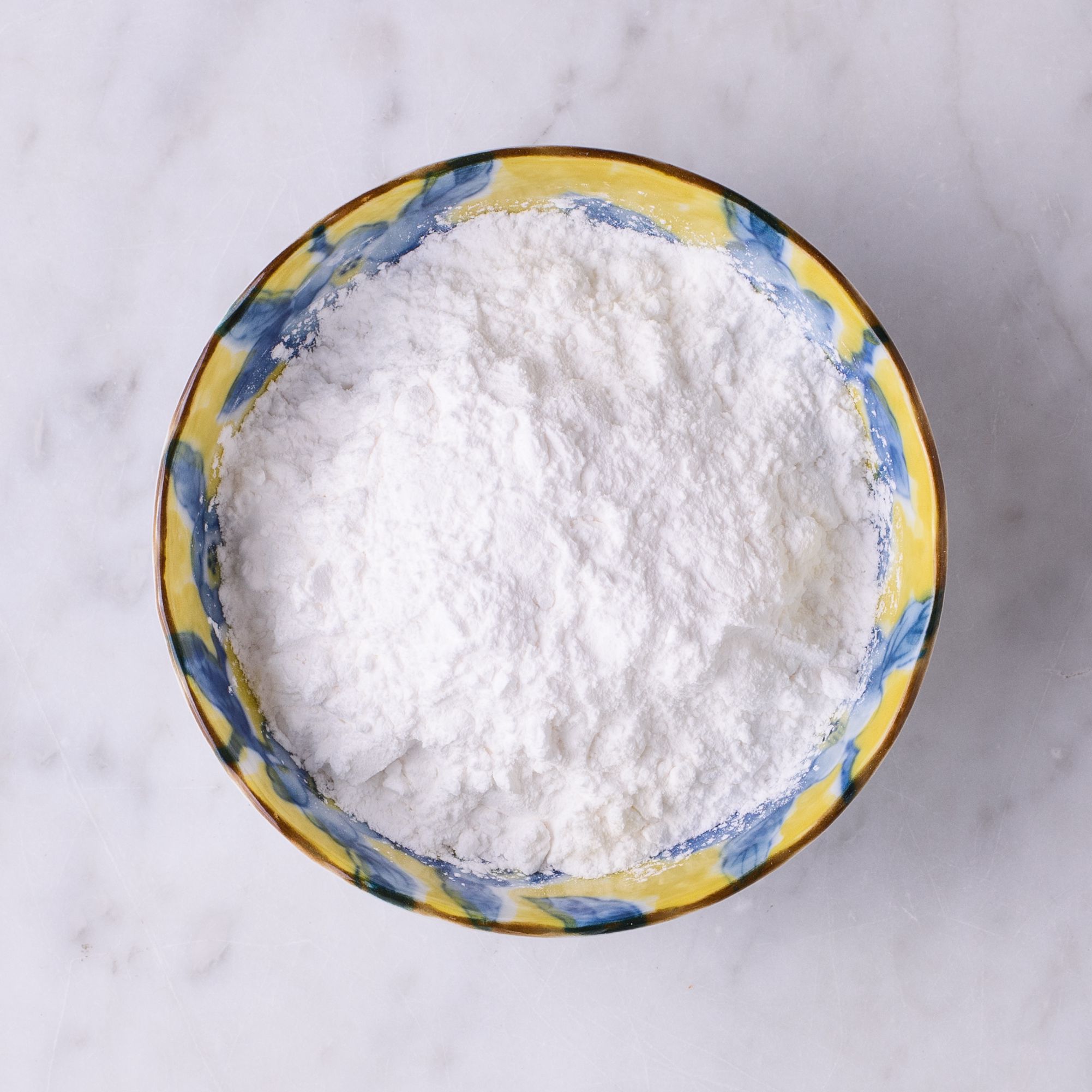 How much cornstarch do I substitute for half a cup of flour?