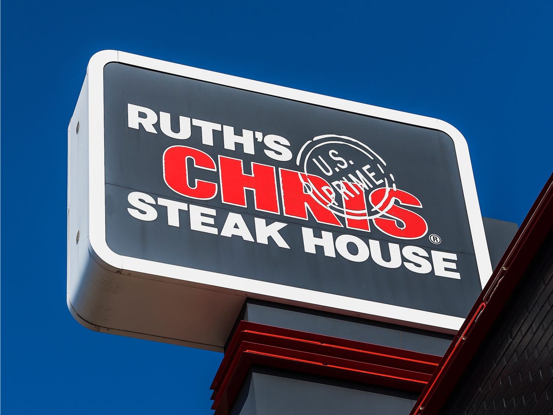 How much did Ruth's Chris Steakhouse owner return in small business loans?