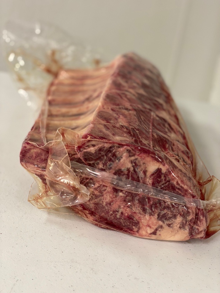 How much does a whole bone in ribeye weigh?