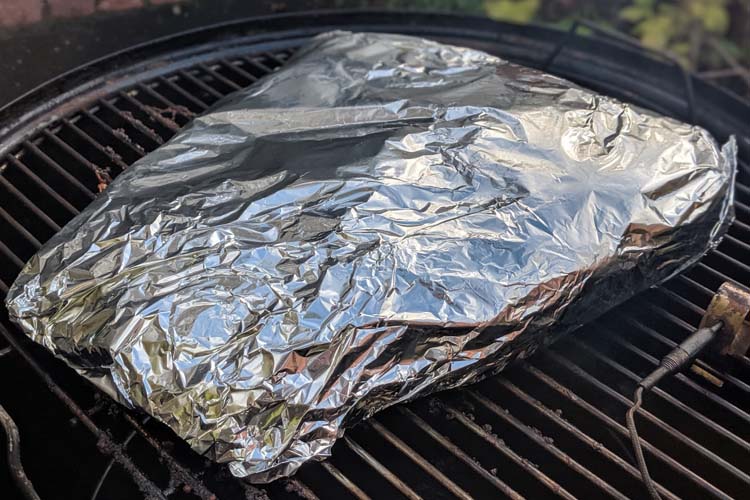 How much faster does brisket cook in foil?