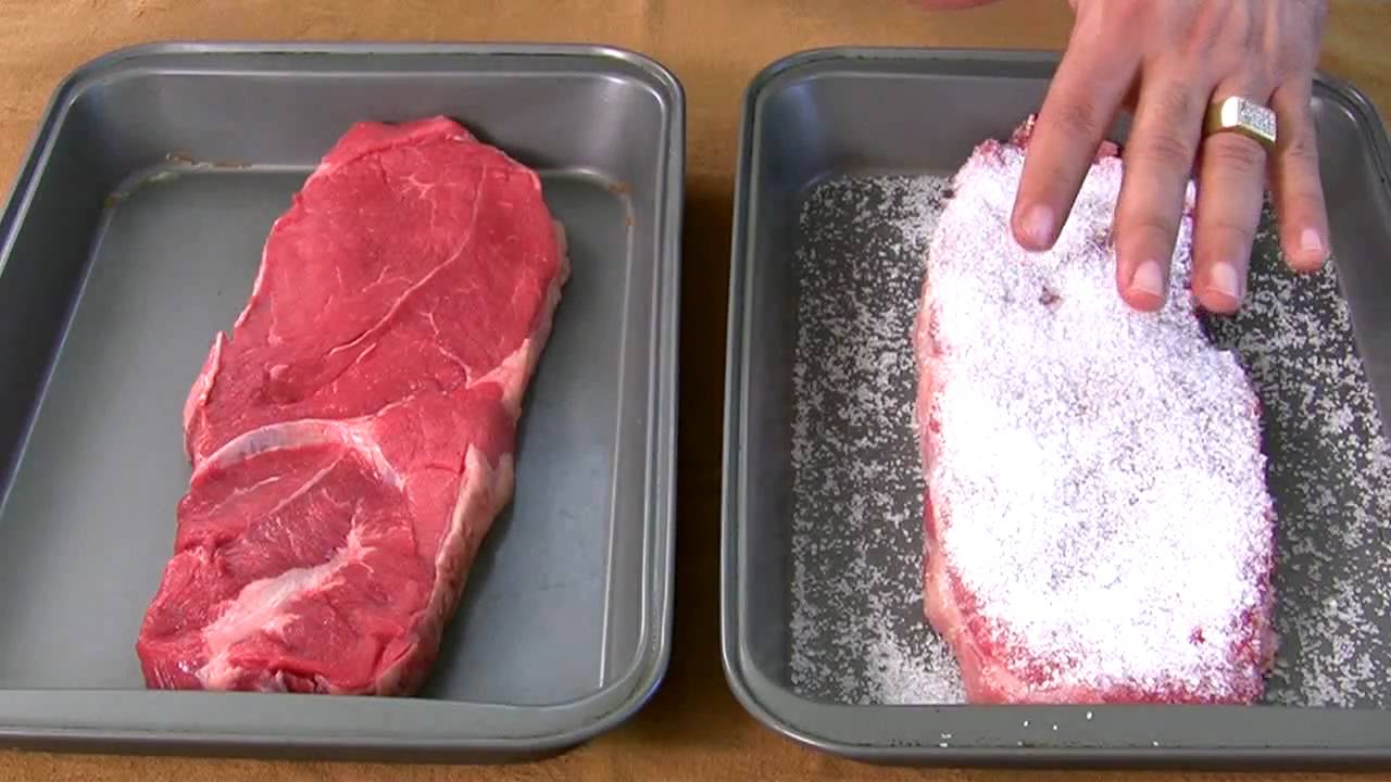 How much salt do you put on steak to tenderize it?